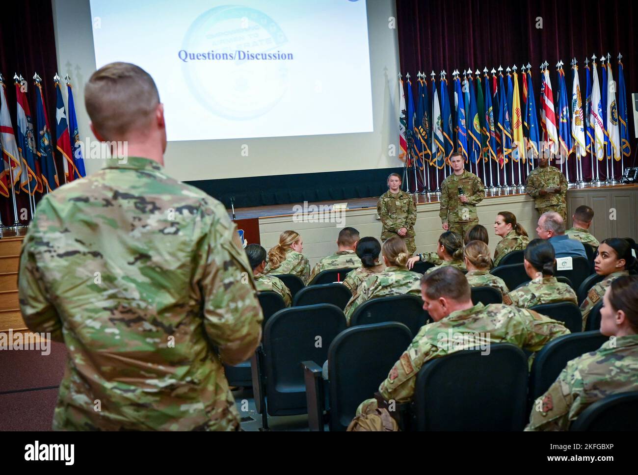 U.S. Air Force Airman 1st Class Sarah Miller, center, 179th Cyber Wing ...