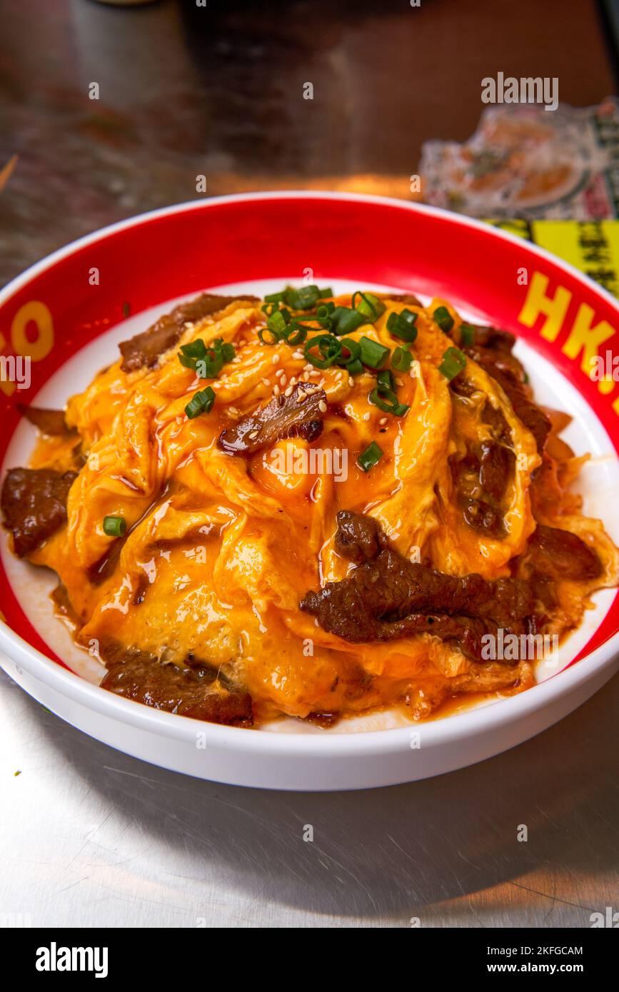 A delicious stir-fried rice noodles with egg and beef in a Hong Kong ...