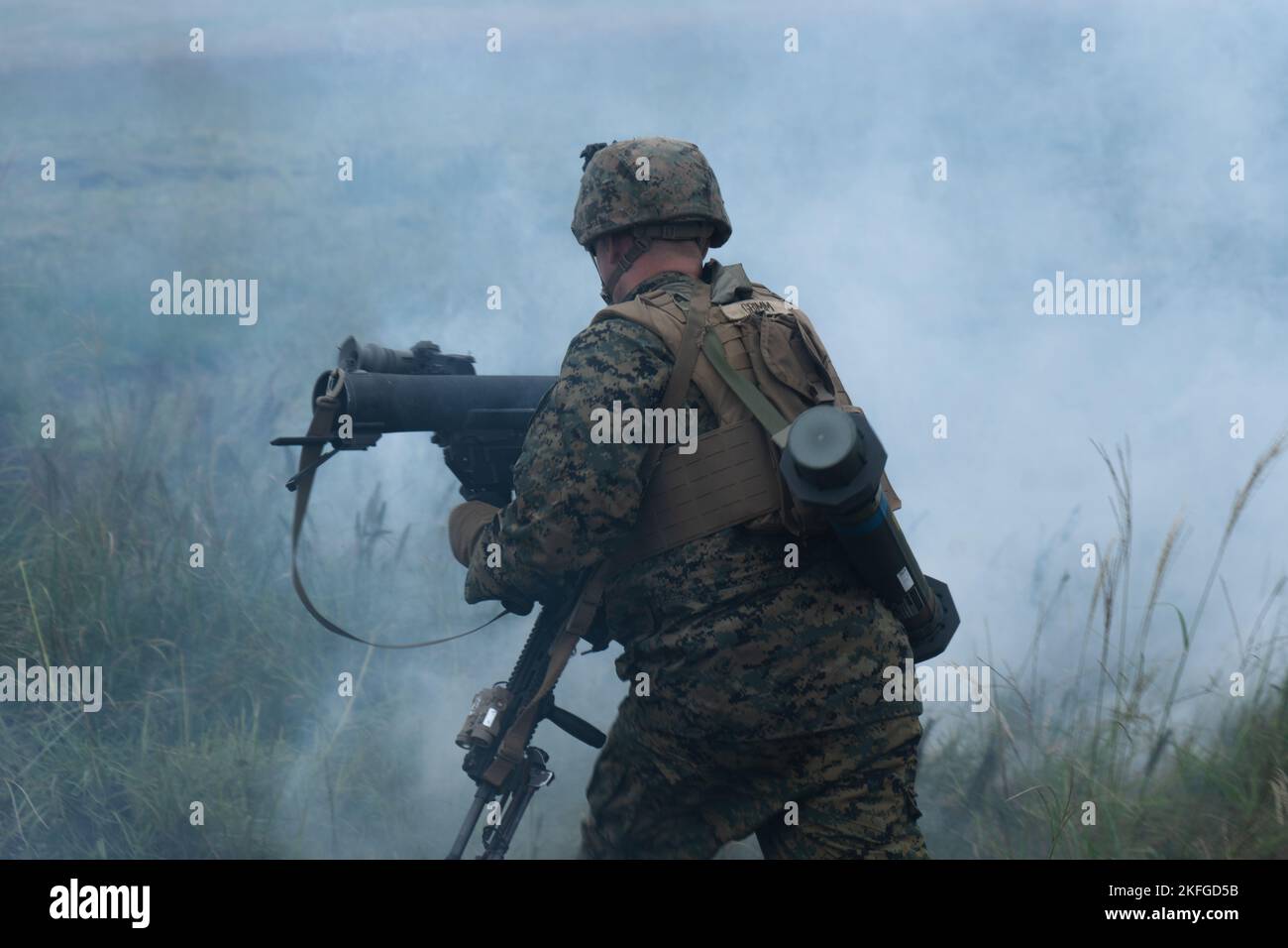 U.S. Marine Corps Cpl. Dylan Grimm, a rifleman with 3d Battalion, 3d ...
