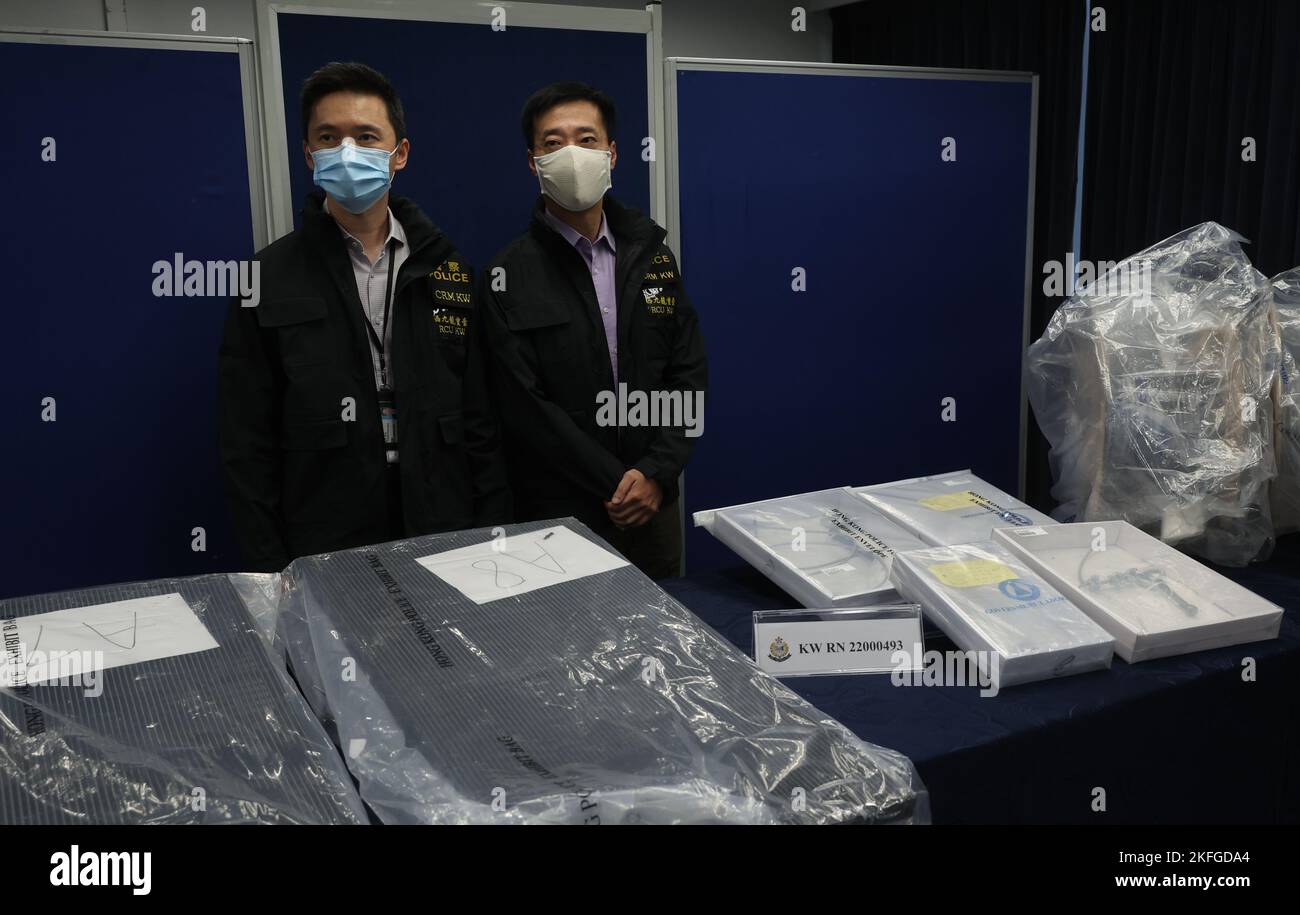(L-R) Chow Chun-choi, Chief Inspector of Police Regional Crime Unit ...
