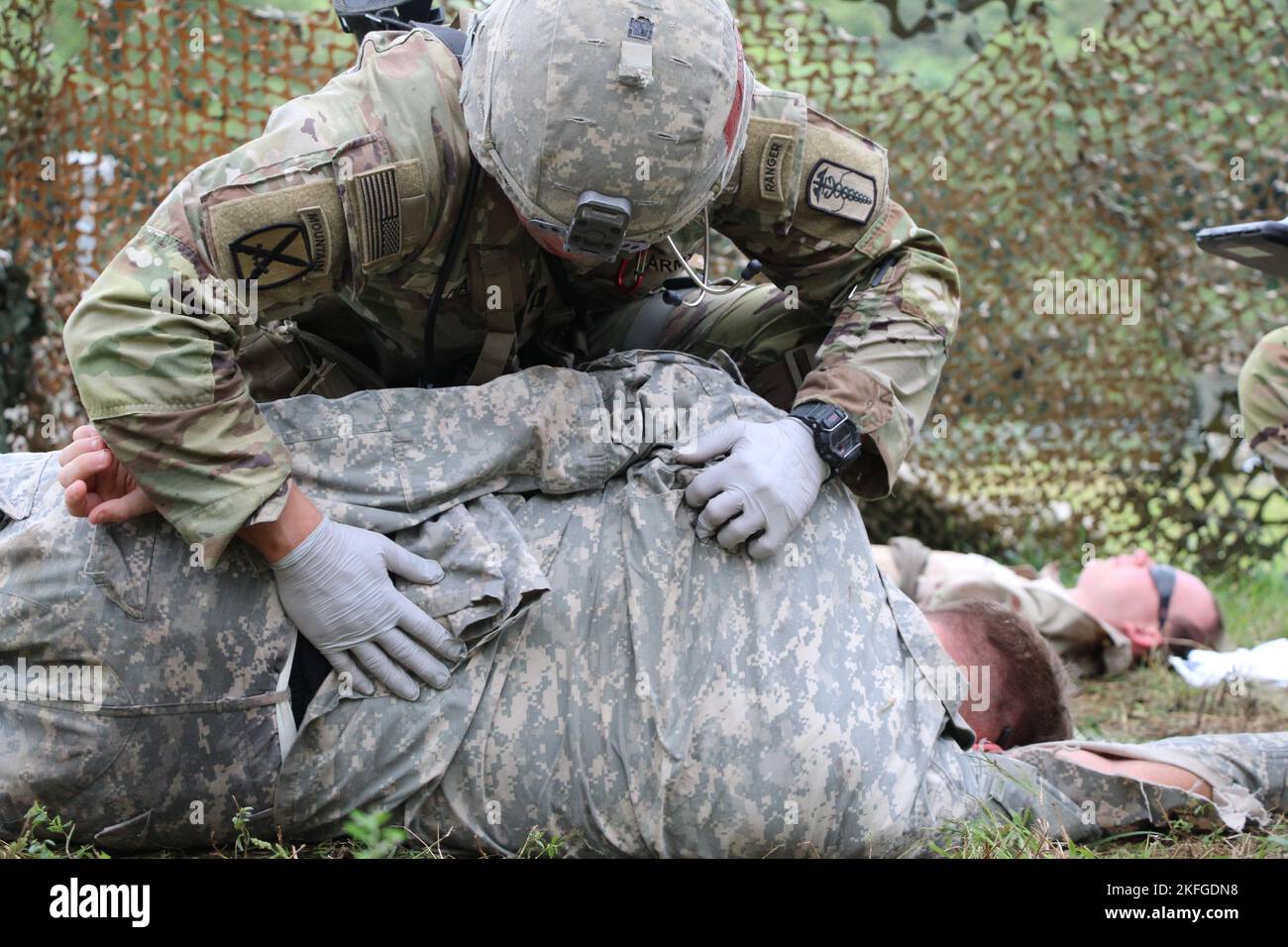 EFMB Candidate treats a casualty during the Tactical Combat Casualty ...