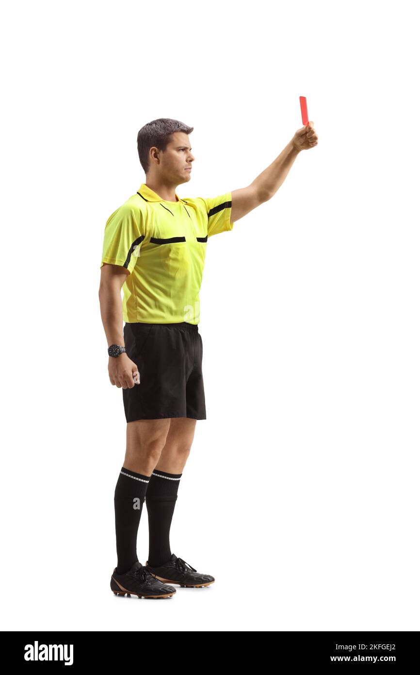 Full length profile shot of a football referee showing a red card ...