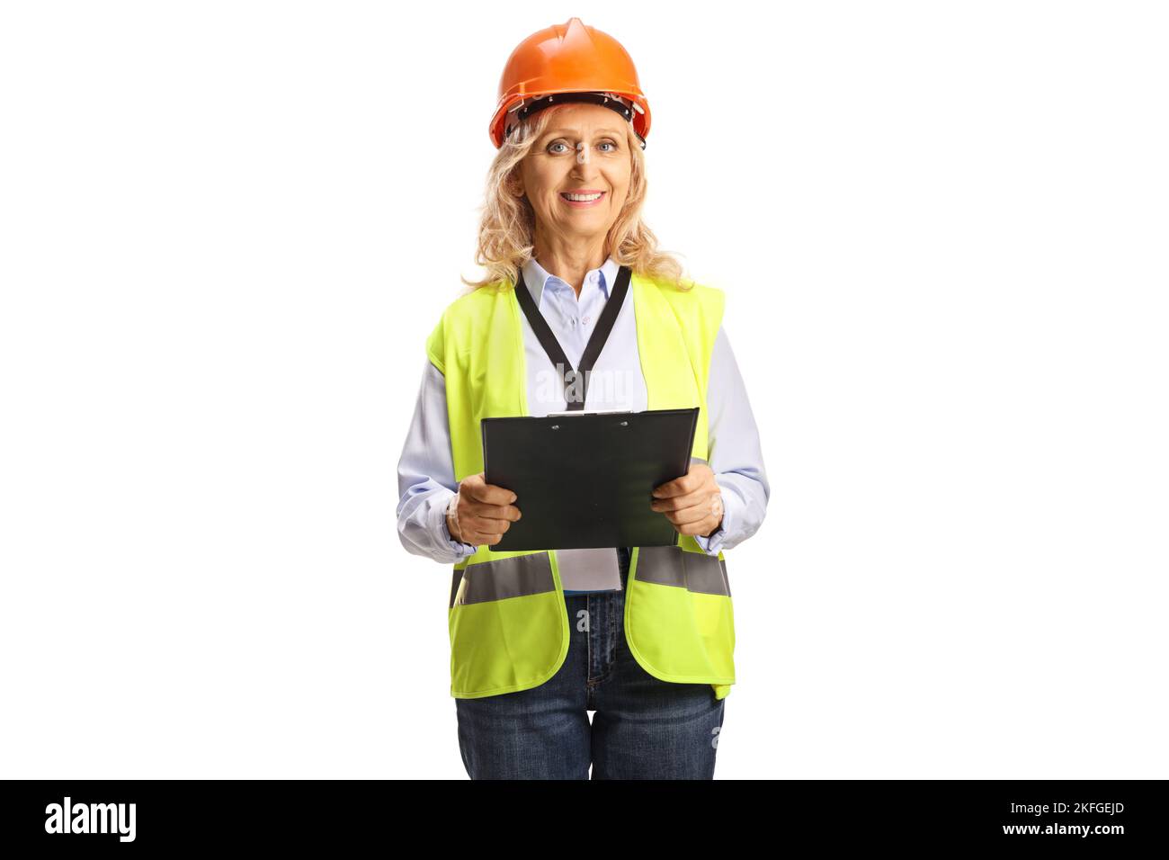 Female engineer with a safety vest and hardhat smiling at camera isolated on white background ...