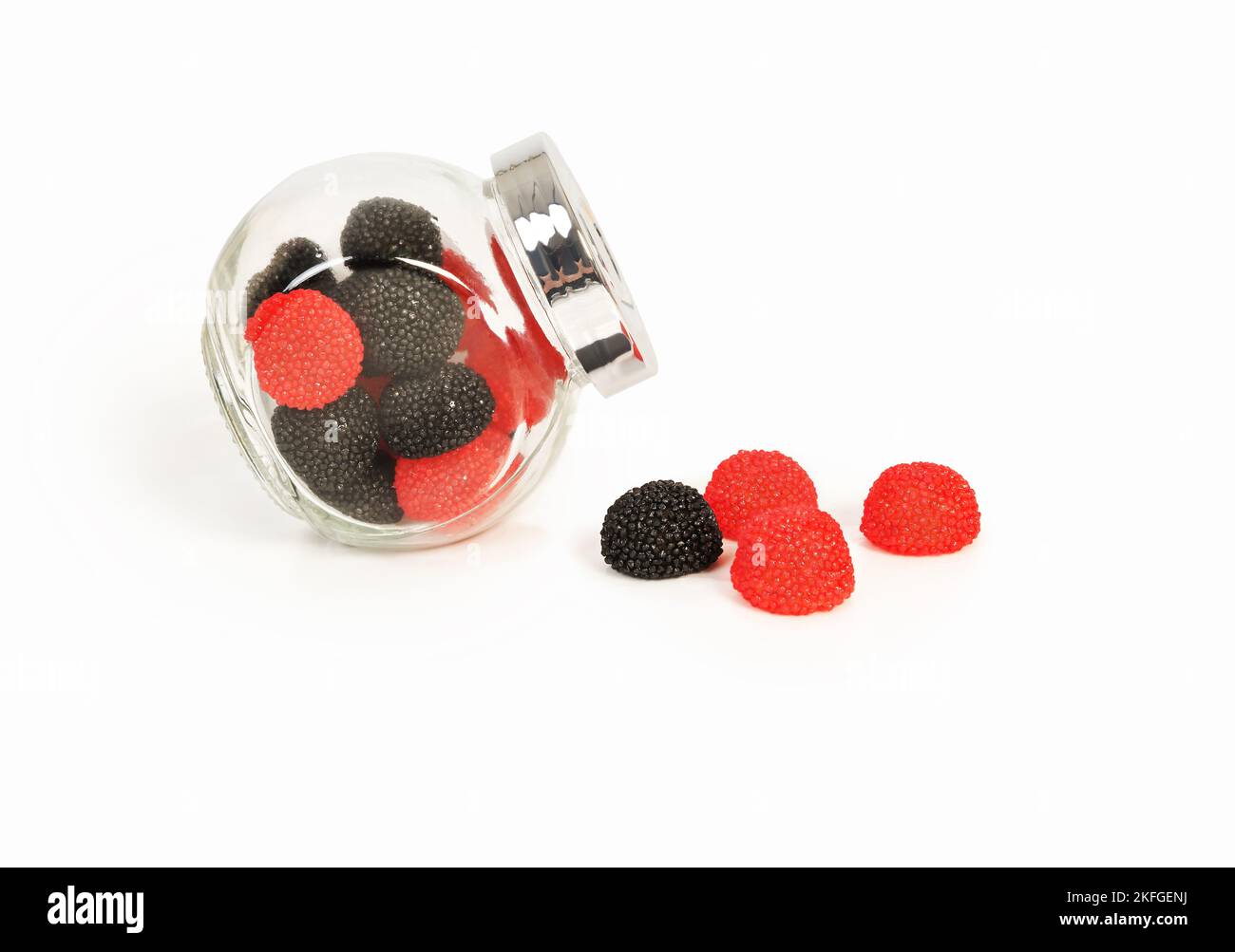 Sweet black and red fruit juice jellies shaped like blackberries and ...