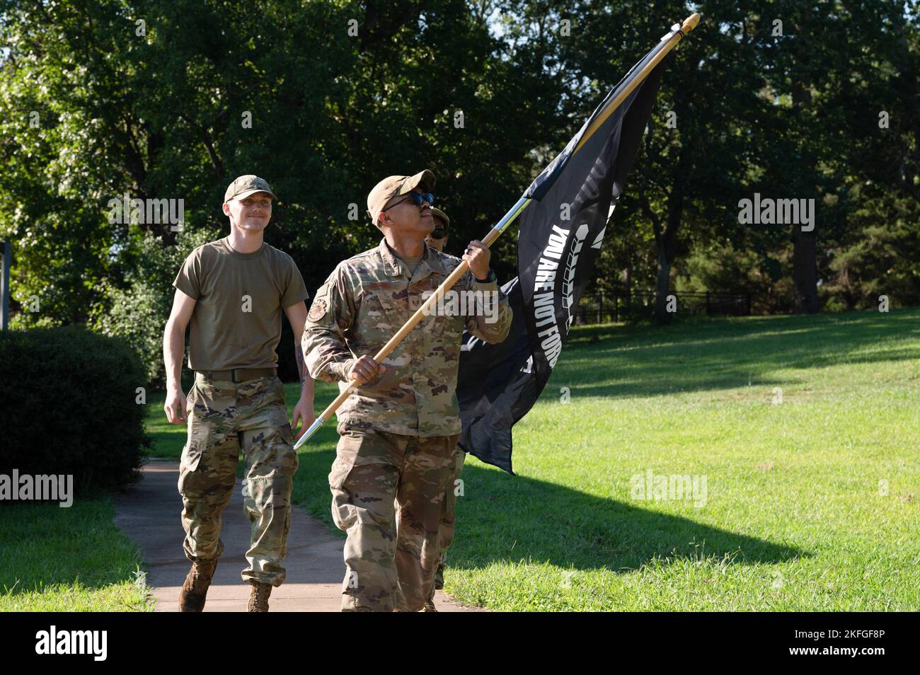 U.S. Airmen assigned to the 20th Civil Engineer Squadron carry the POW ...