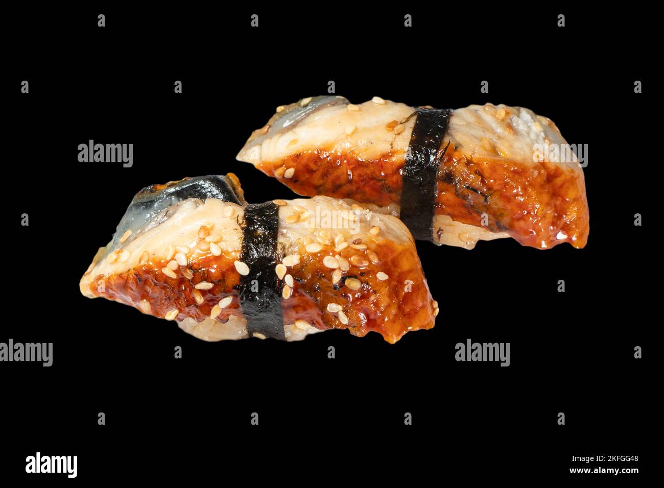 Unagi nigiri sushi isolated on black background. Delicious unagi eel nigiri sushi Stock Photo ...