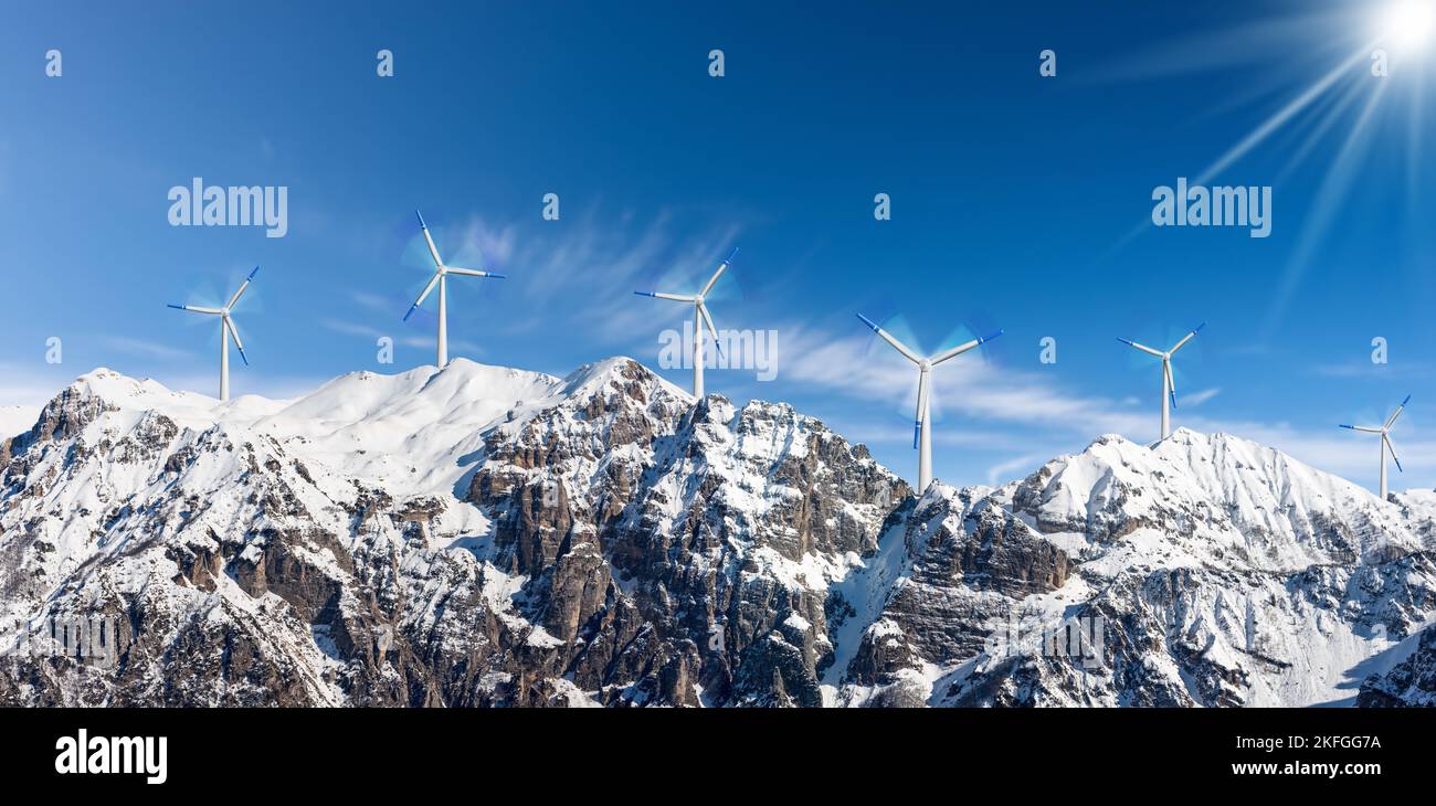 Panorama mountains in snow turbine wind energy electricity hi-res stock ...