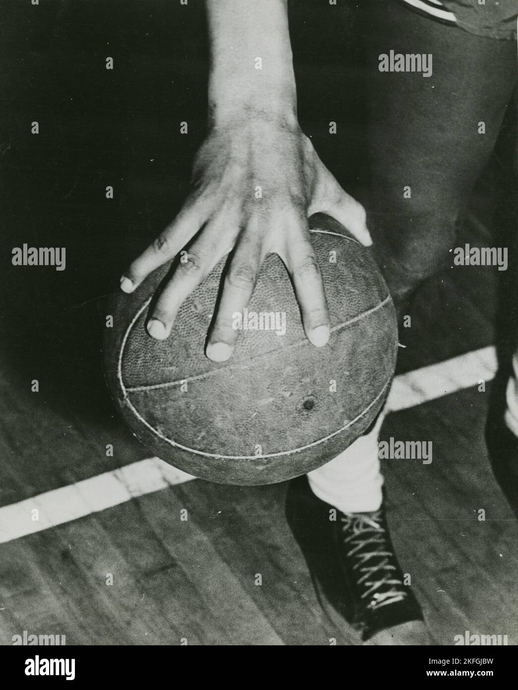 Huge hand span makes ball handling easy, 1947 Stock Photo - Alamy
