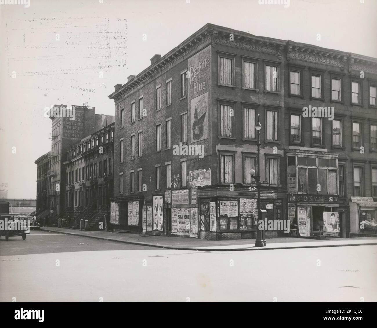 Boarded residential building on the corner of Madison Avenue and East ...