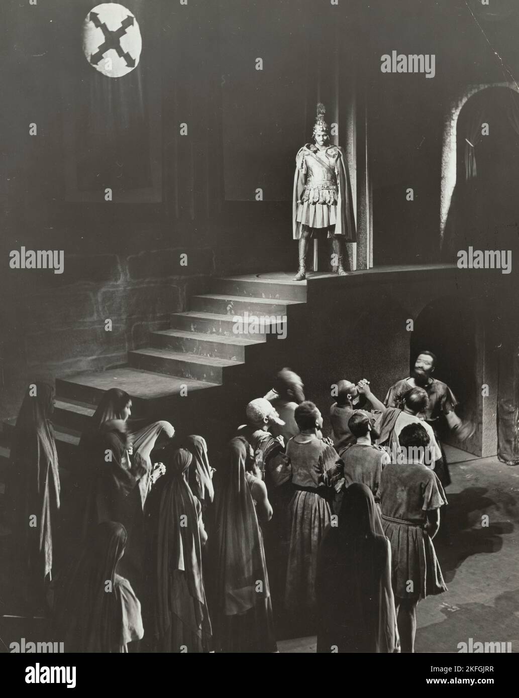 Man standing above crowd, 1938 Stock Photo - Alamy