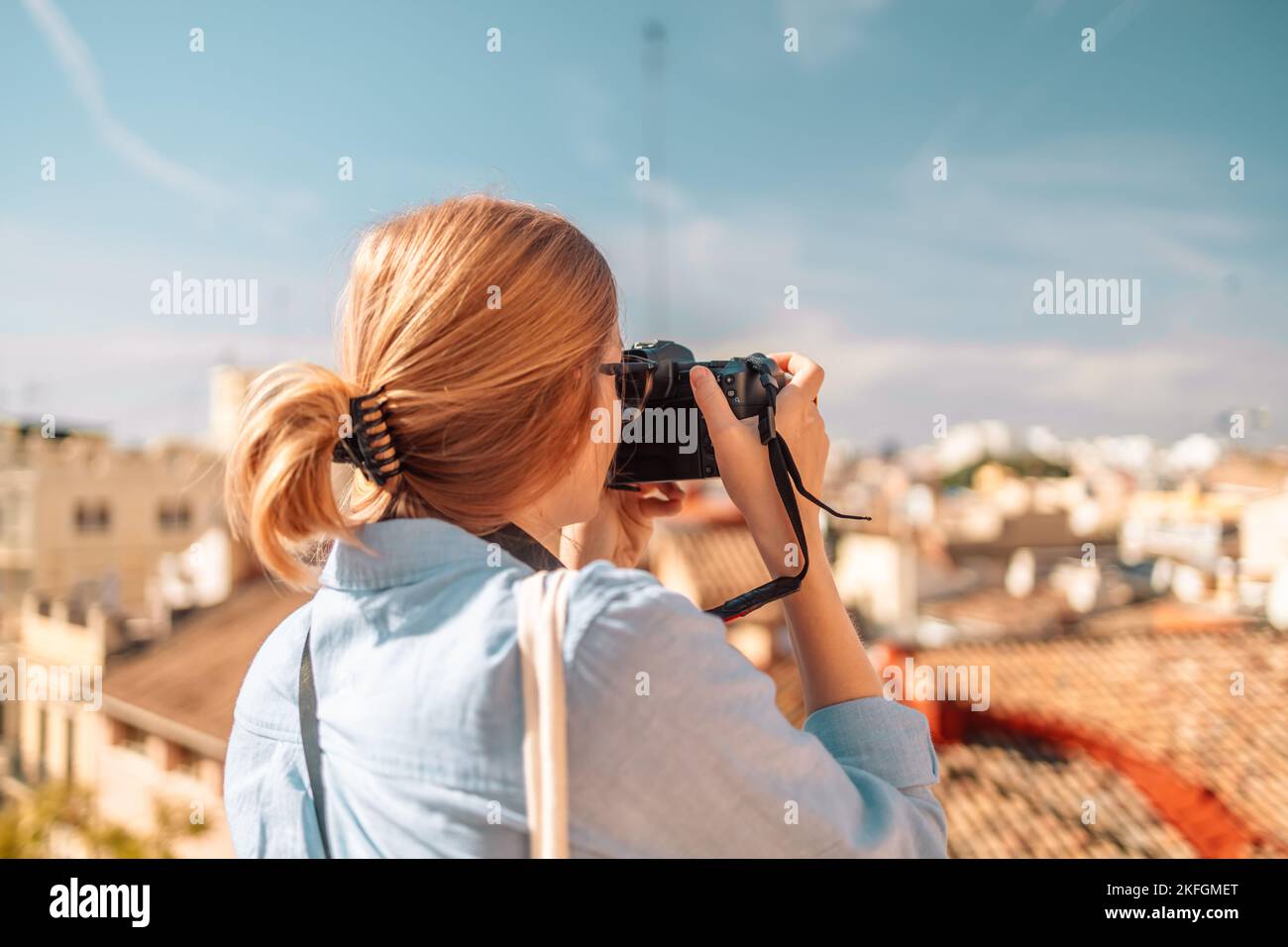 Valencia city old town woman tourist taking picture with camera of ...