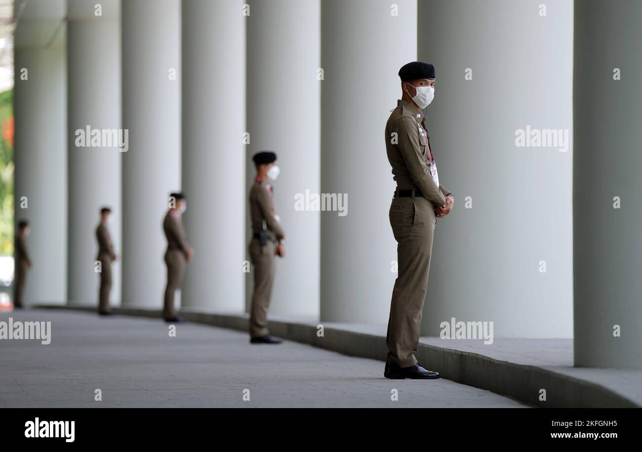 Police officers stand guard in the Queen Sirikit National Convention ...