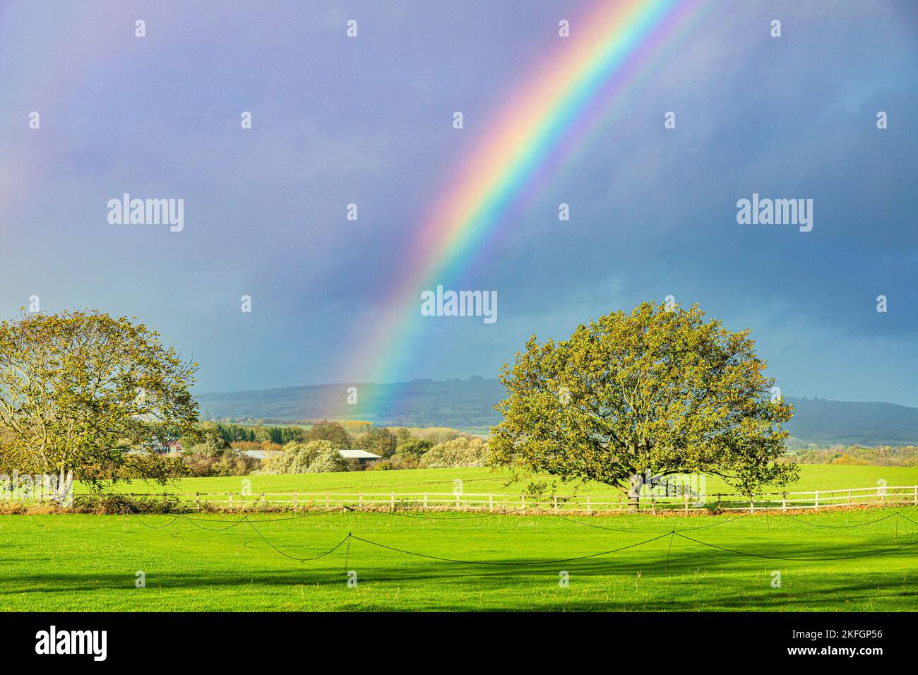 A rainbow over fields near the Cotswold village of Laverton ...
