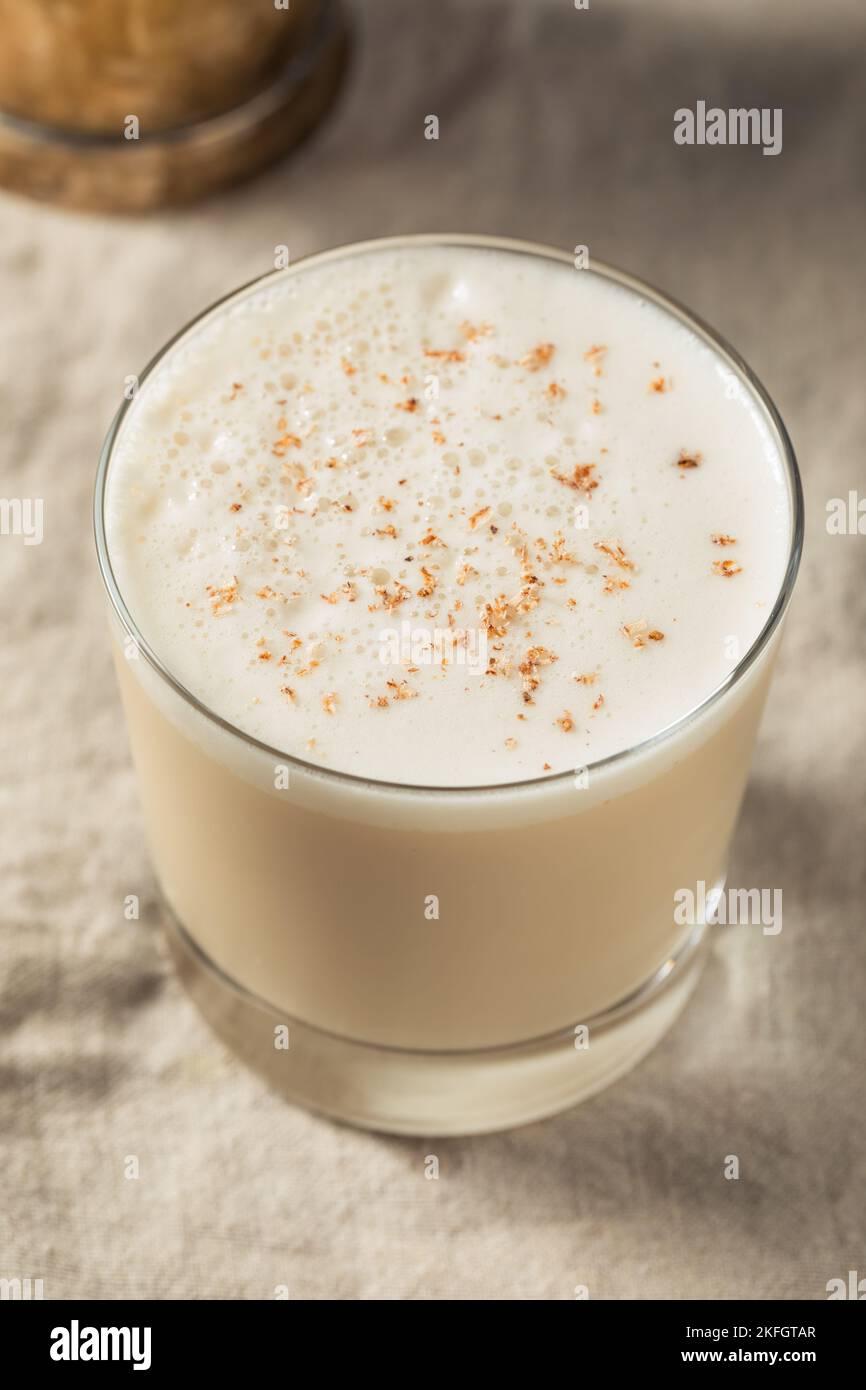 Homemade Boozy Brandy Milk Punch Cocktail with Nutmeg Stock Photo - Alamy