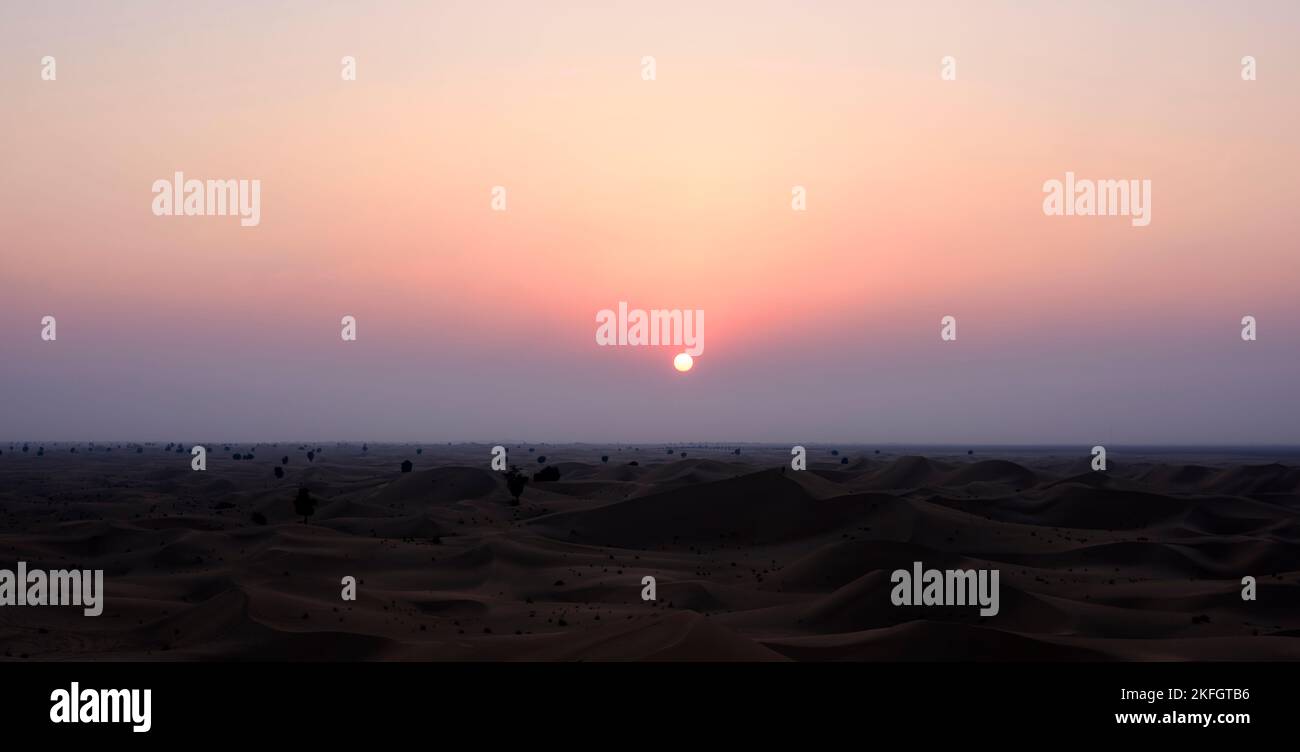 Sunset in the desert of the United Arab Emirates, Arabian Peninsula ...