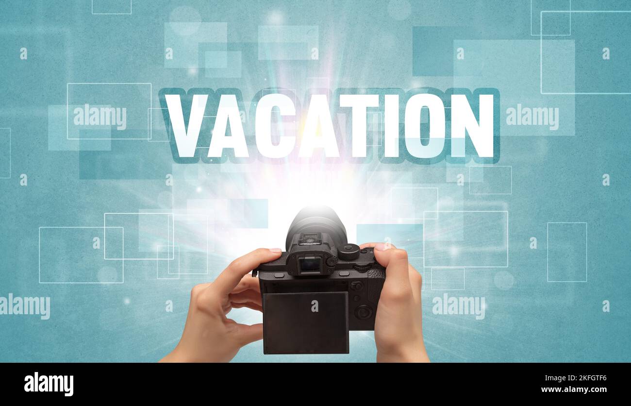hand holding digital camera, traveling concept Stock Photo - Alamy