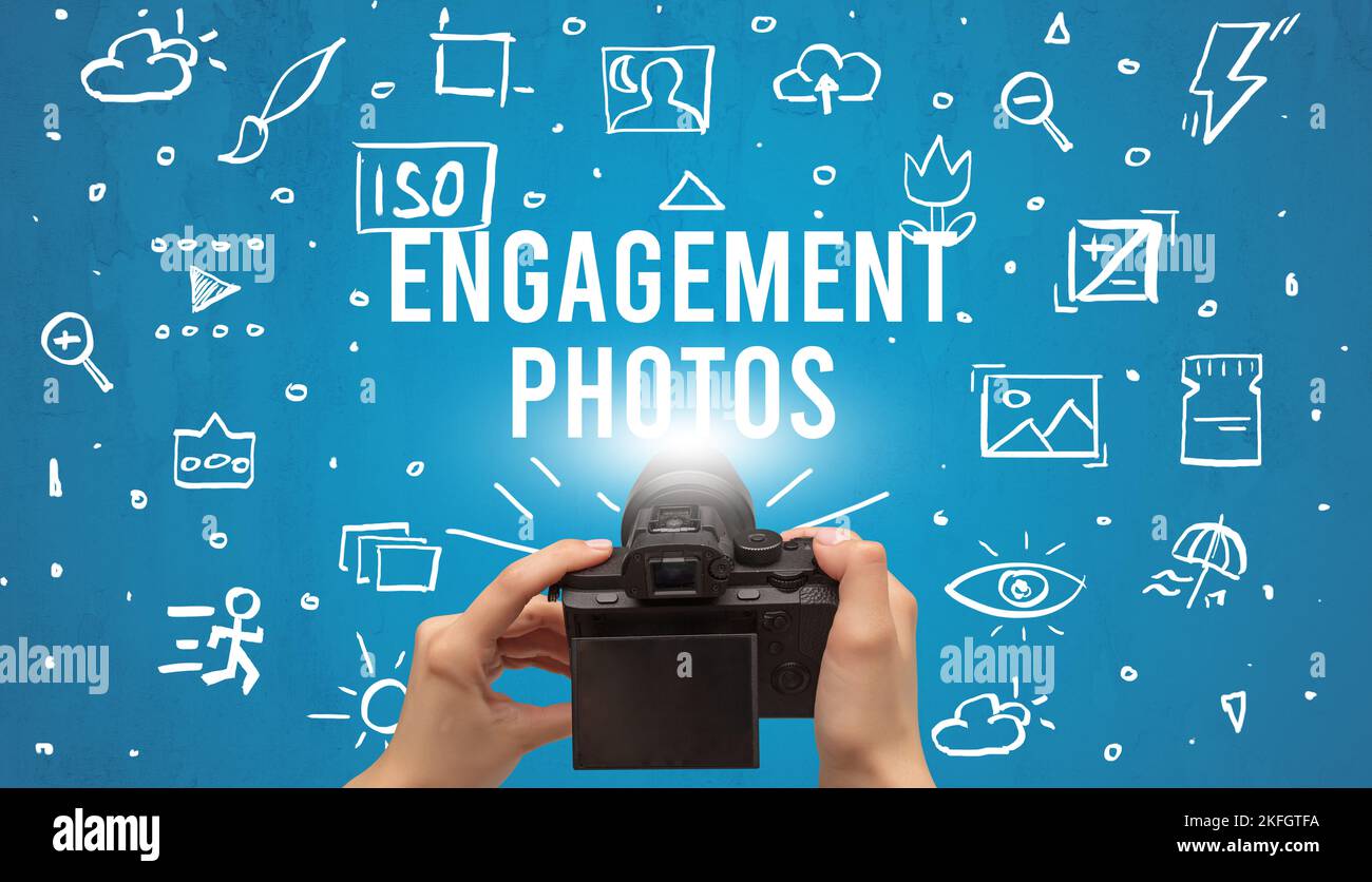 Hand taking picture with digital camera Stock Photo - Alamy