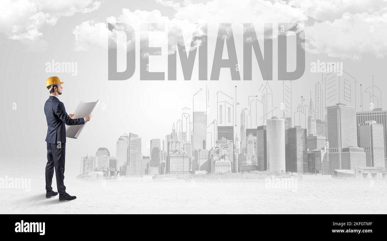 Young businessman with hard hat Stock Photo - Alamy