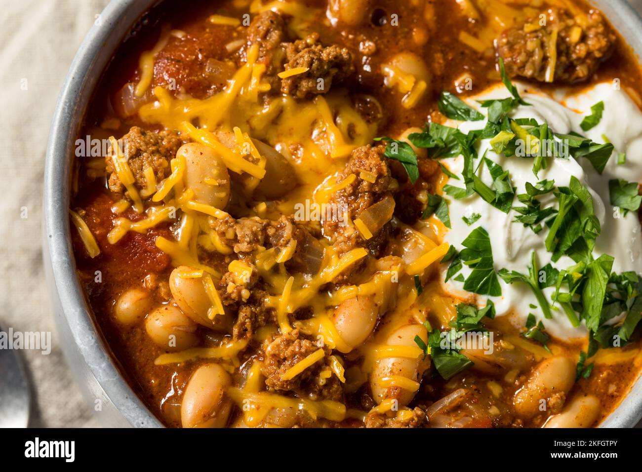 Homemade Turkey Chili Con Carne with Sour Cream and Cheese Stock Photo ...