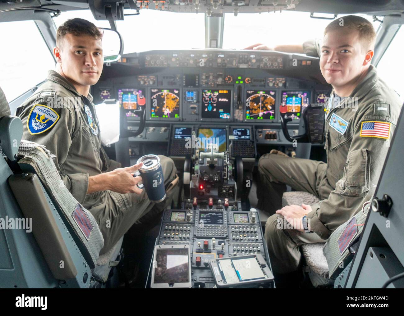 220916-N-HG389-0008 SINGAPORE (Sep. 14, 2022) Lt. Josh Monteville, left ...