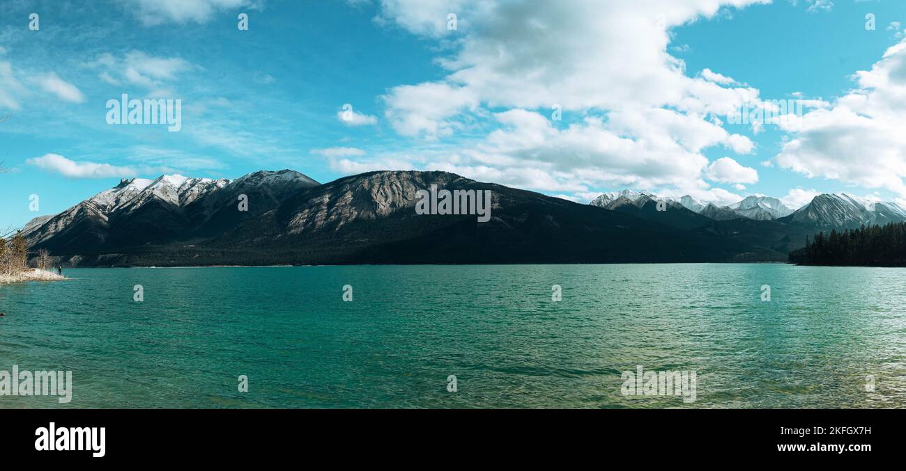 A panoramic view of a calm lake on a mountain background in the Banff ...