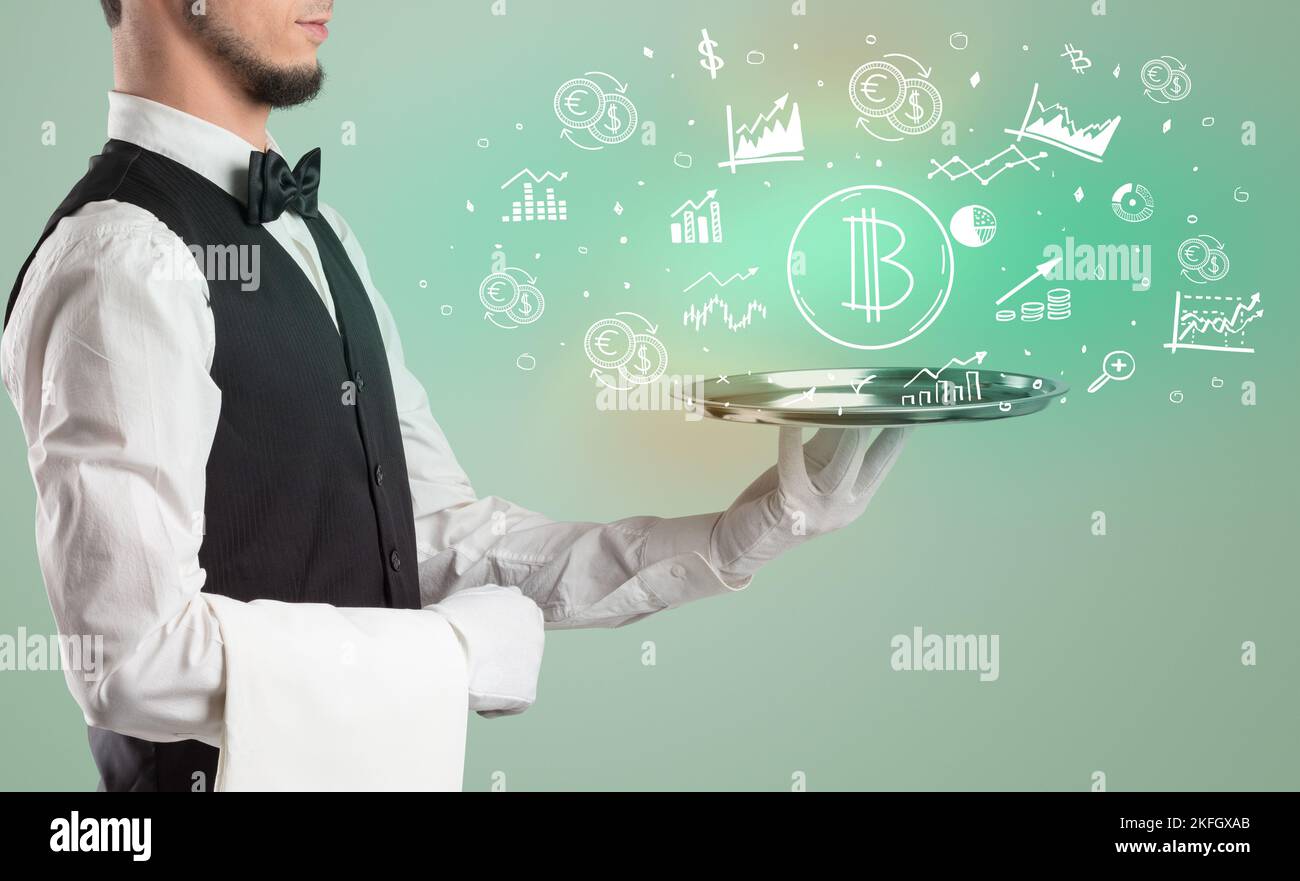 Handsome young waiter in tuxedo holding money icons on tray Stock Photo ...