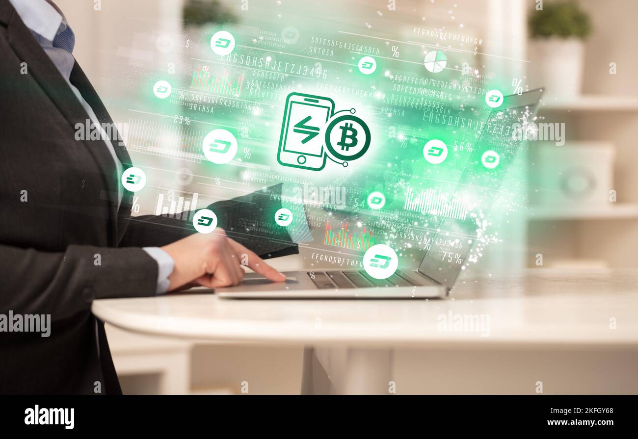 Young man watching stock market on laptop Stock Photo - Alamy