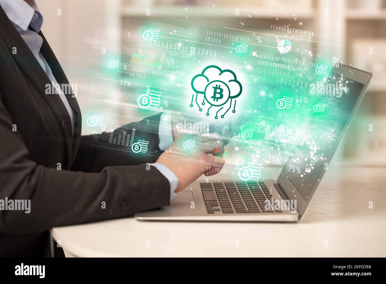 Young man watching stock market on laptop Stock Photo - Alamy