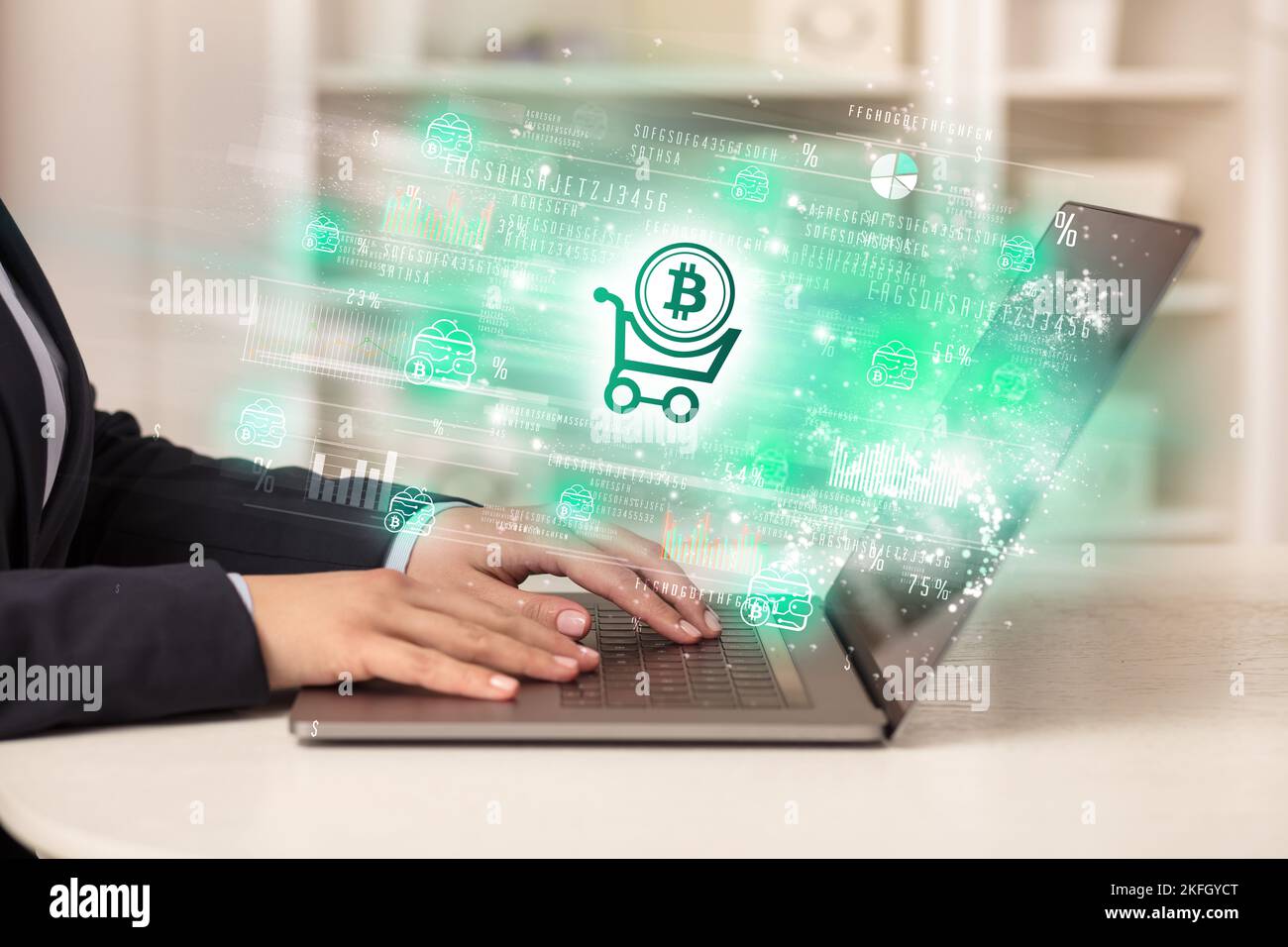 Young man watching stock market on laptop Stock Photo - Alamy