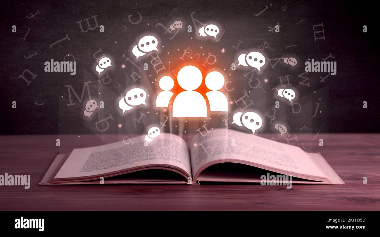 Open book with social networking icons above Stock Photo - Alamy