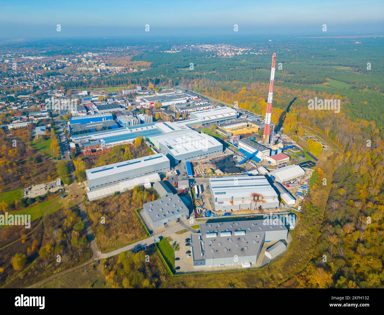 Aerial view to industrial zone and technology park suburb city in ...