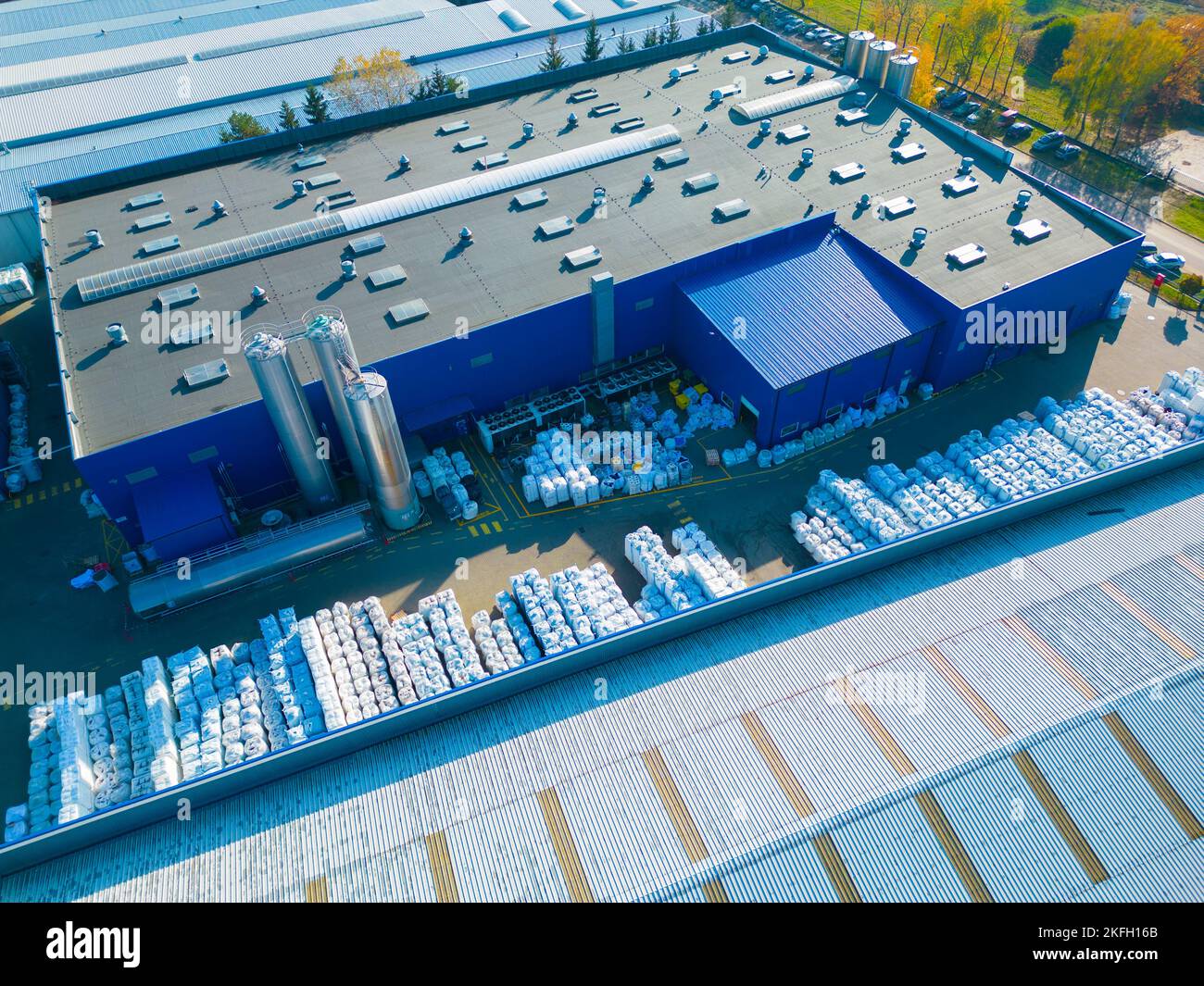 Aerial view of a warehouse or industrial plant or logistics center from ...