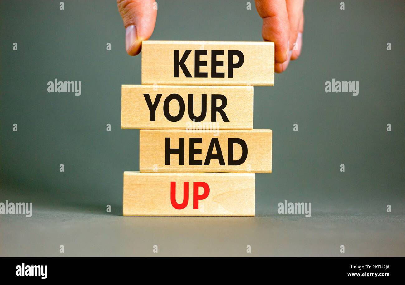 Keep your head up symbol. Concept words Keep your head up on wooden ...