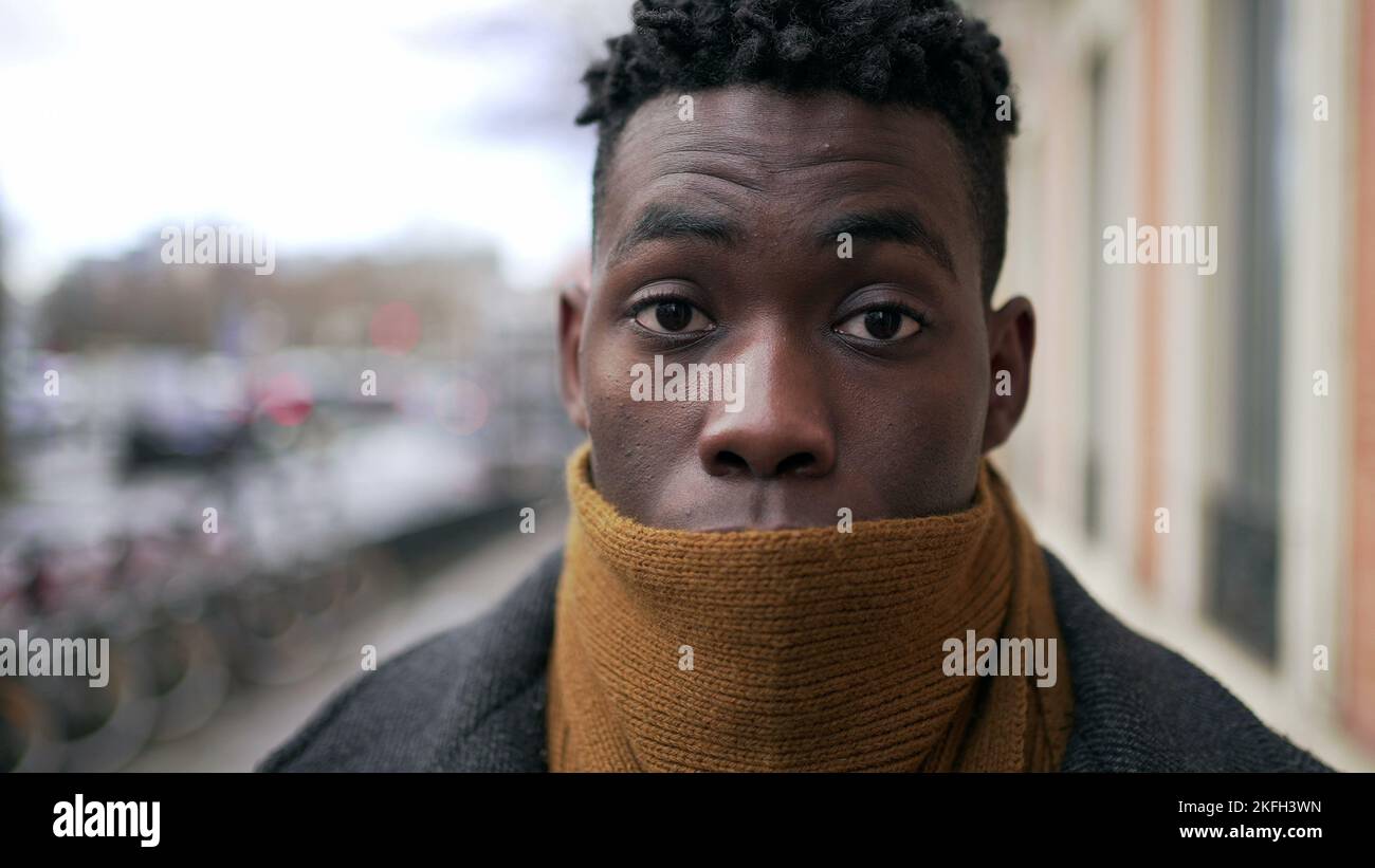 Elegant black african man walking in european downtown Stock Photo - Alamy