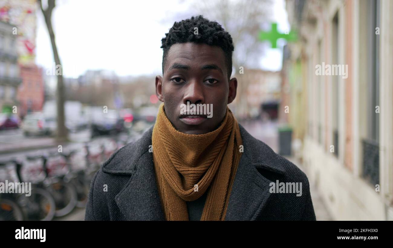Elegant black african man walking in european downtown Stock Photo - Alamy