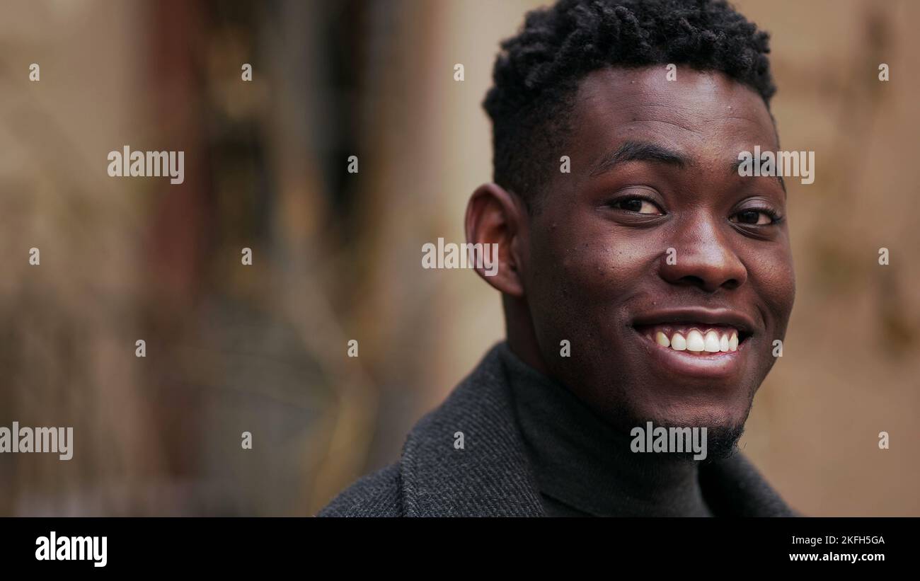 Friendly happy black African man portrait close-up smiling Stock Photo ...
