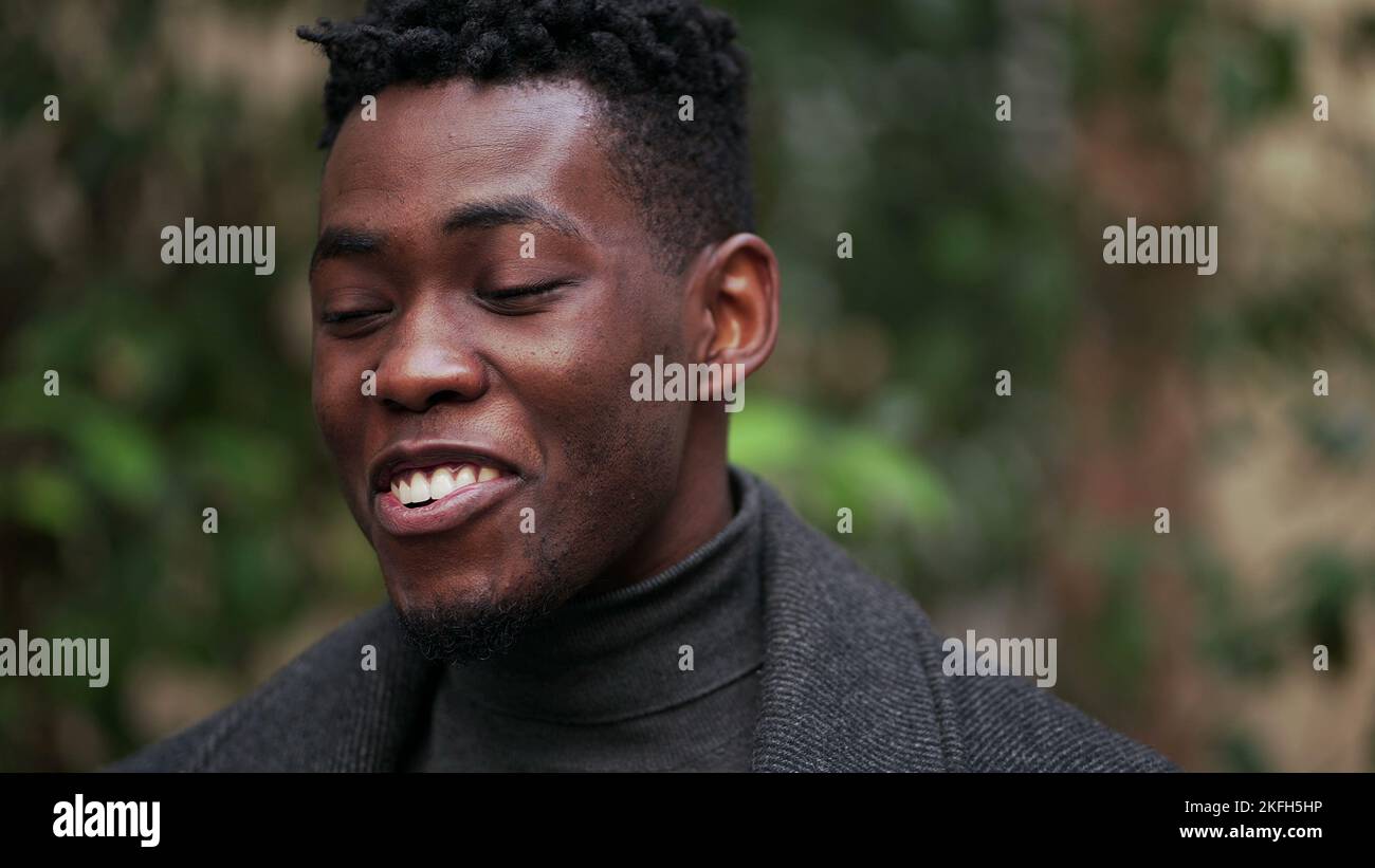 Friendly happy black African man portrait close-up smiling Stock Photo ...