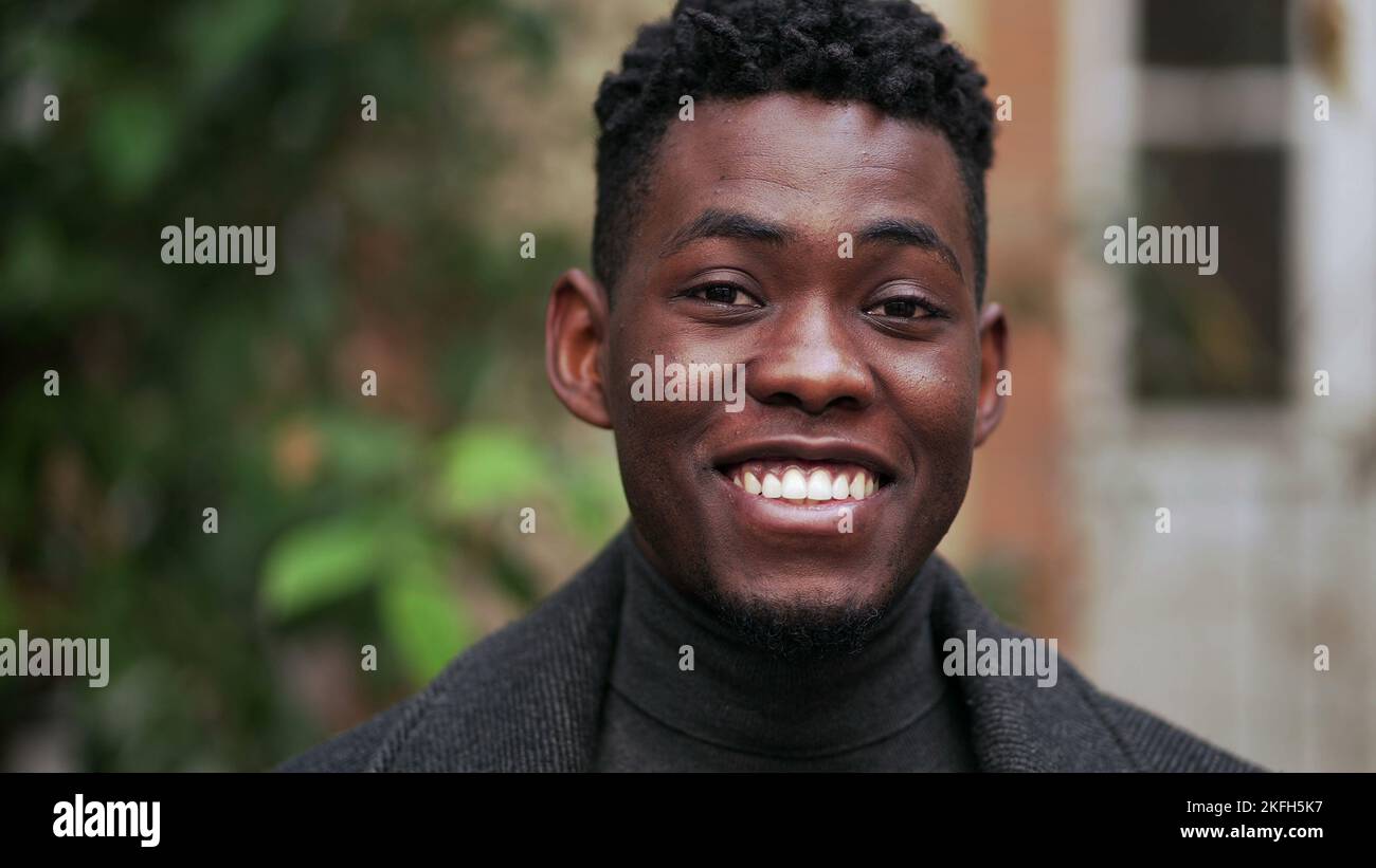 Friendly happy black African man portrait close-up smiling Stock Photo ...