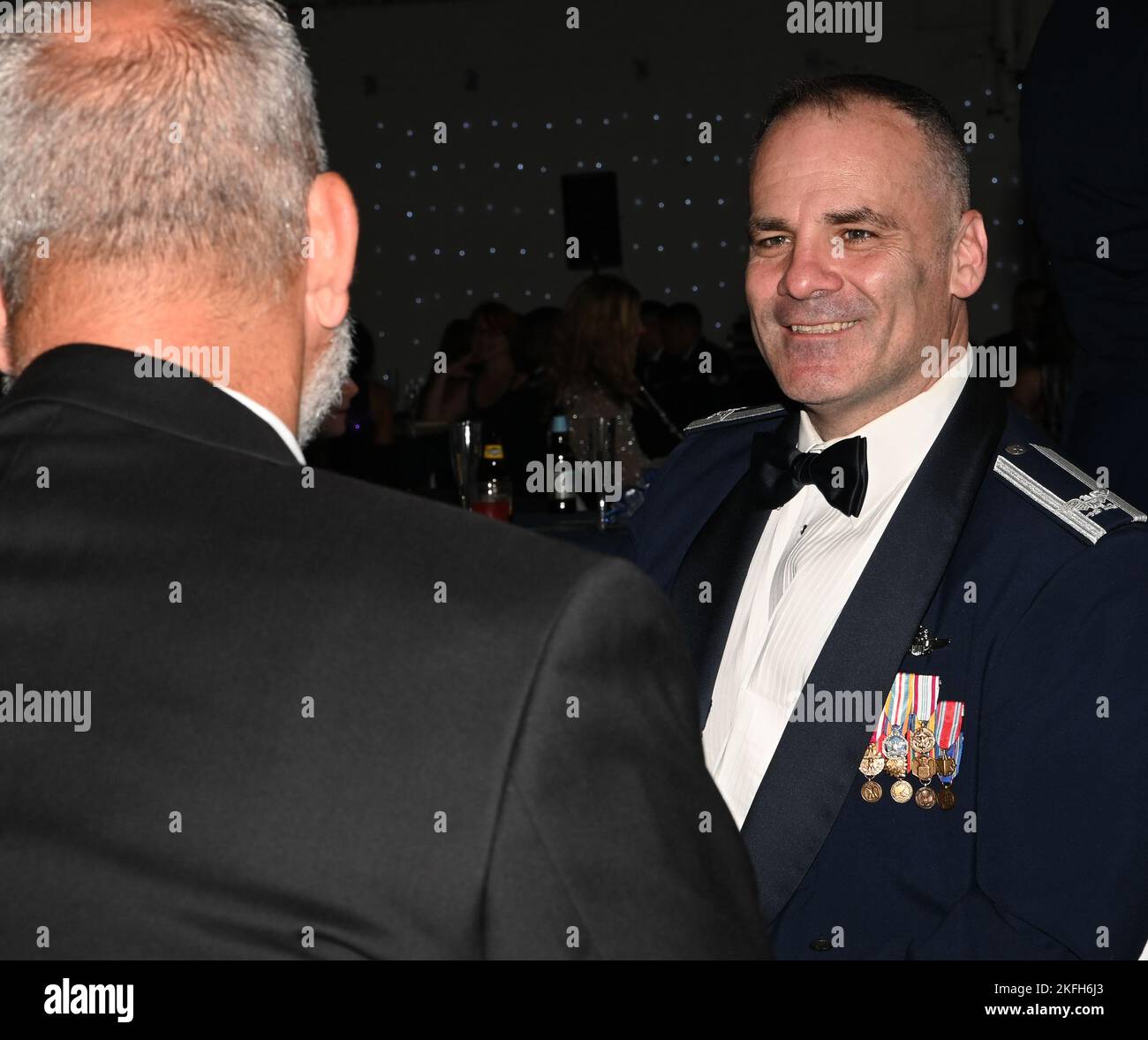 Col. Maxwell DiPietro, 509th Bomb Wing vice commander, converses at the ...