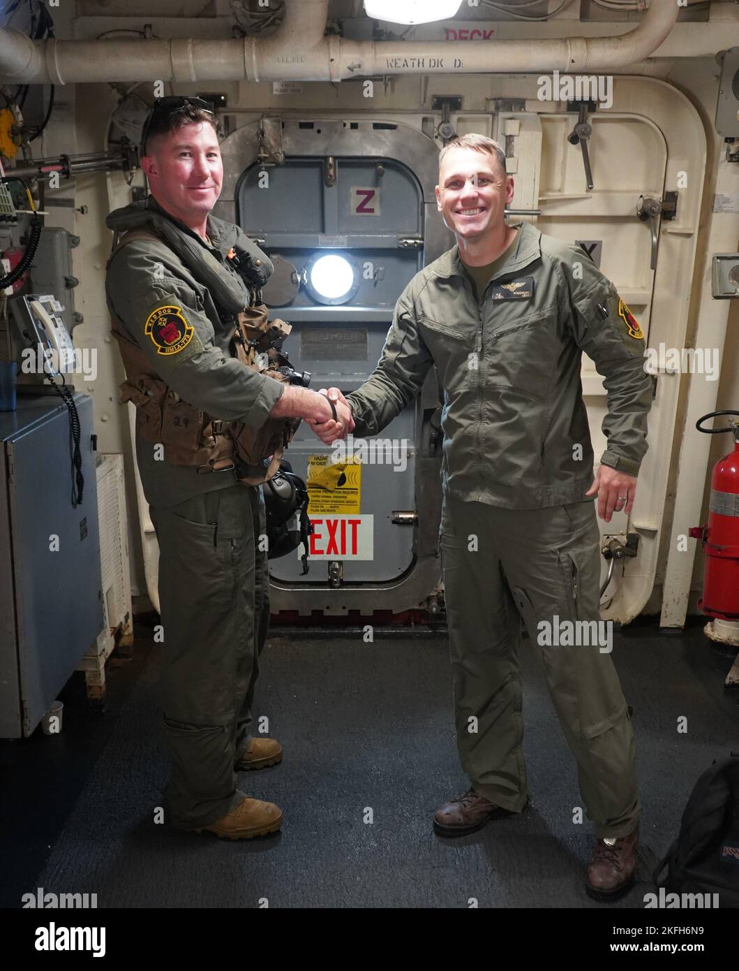 U.S. Marine Corps Lt. Col. William Woodward, right, commanding officer of Marine Light Attack ...