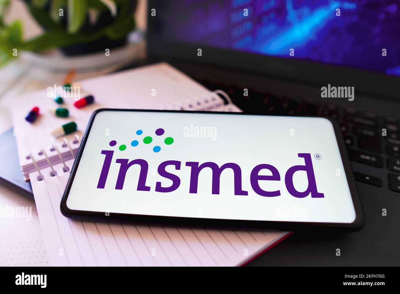 In this photo illustration, the Insmed logo is displayed on a ...