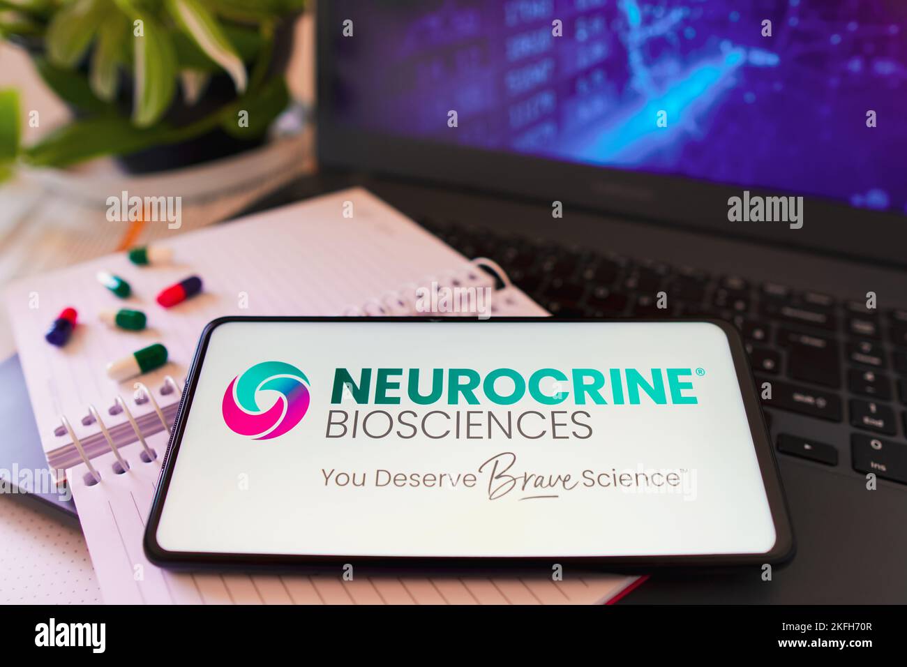 In this photo illustration, the Neurocrine Biosciences logo is ...