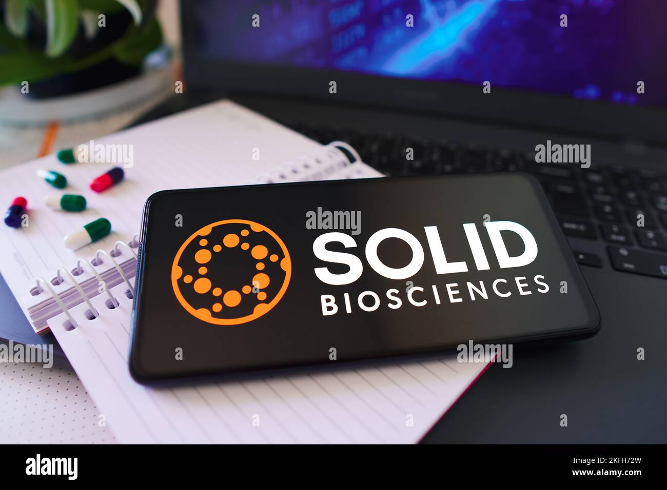 In this photo illustration, the Solid Biosciences logo is displayed on a smartphone screen Stock ...