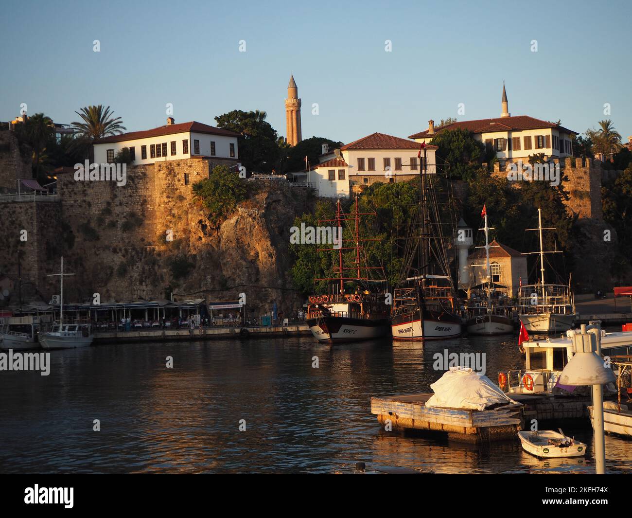 Antalya old marina. Historical houses and Yivli Minaret Mosque. Kaleiçi ...