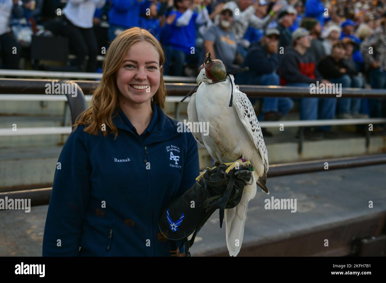 An Air Force Academy cadet holds a falcon from the school’s falconry ...