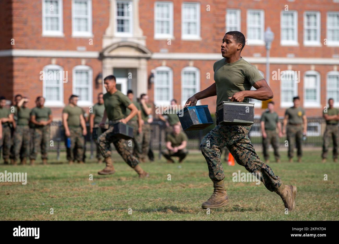 U.S. Marine Corps Sgt. Kershon Manciel, competes in an ammo can relay ...