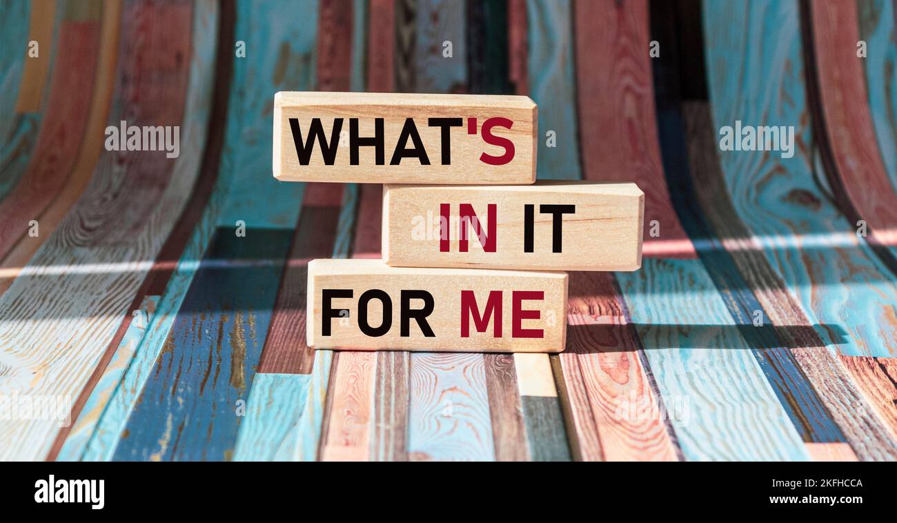 WHAT'S IN IT FOR ME text on wooden blocks and vintage background Stock ...