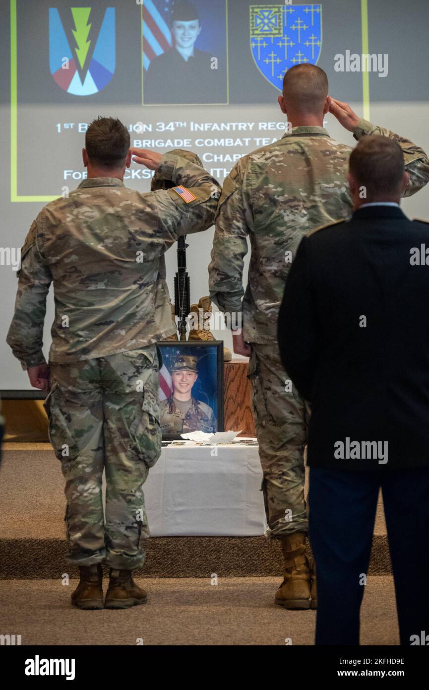 Soldiers assigned to the 1st Battalion, 34th Infantry Regiment, salute ...