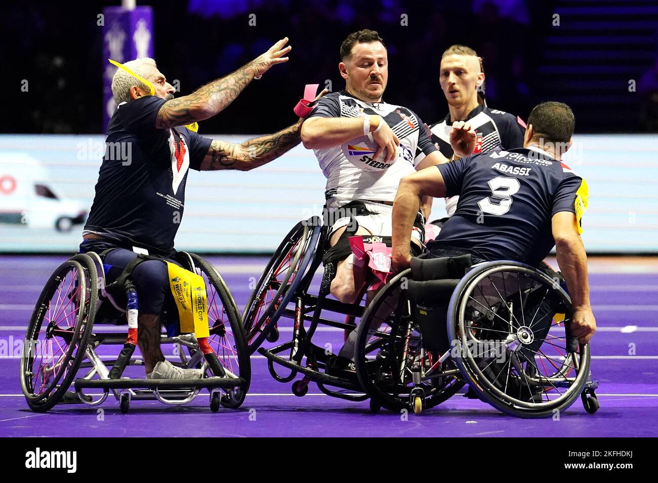England's Sebastien Bechara (centre) battles for the ball with France's ...
