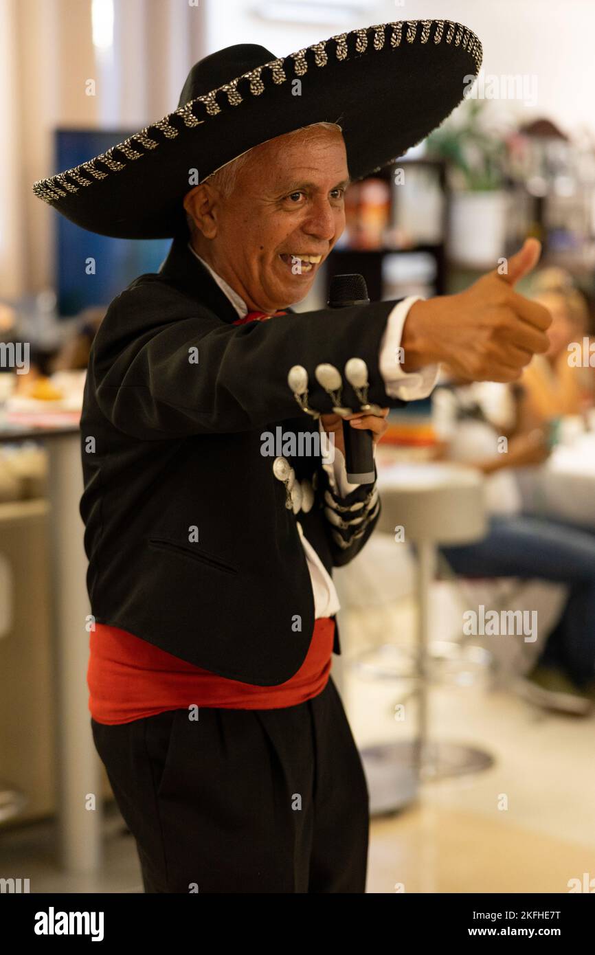 Juan Carlos Lugo leads a "La Raspa” group dance during a Mexican ...
